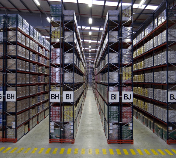 A warehouse with pallet racks to hold more than 30,000 pallets ...